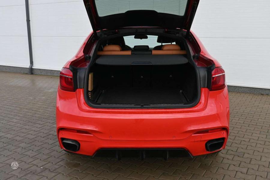 Red BMW X6 2015 in Kretinga, with an engine capacity of 2.98 L and mileage of 128 thousand km for 28999 €, photo 12 on AUTOMOTO.COM.LV
