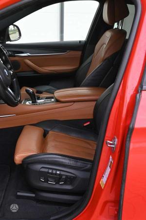 Red BMW X6 2015 in Kretinga, with an engine capacity of 2.98 L and mileage of 128 thousand km for 28999 €, photo 18 on AUTOMOTO.COM.LV