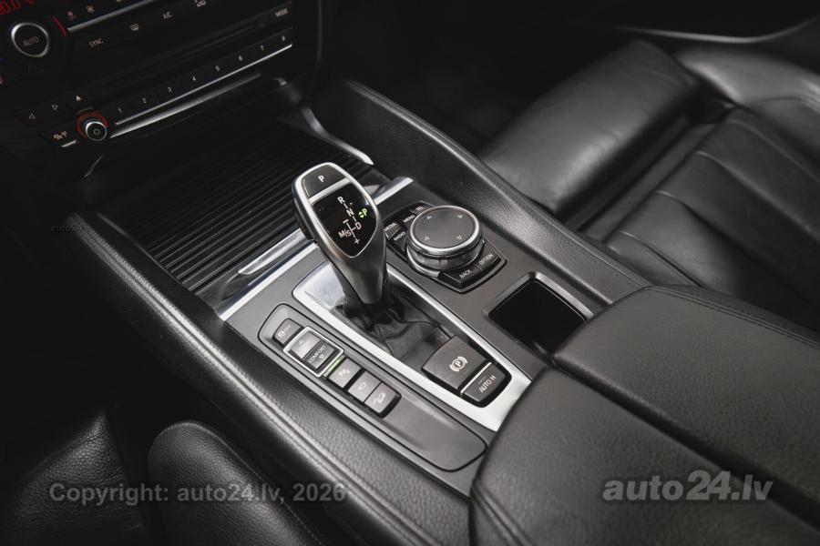 Red BMW X6 2015 in Tartu, with an engine capacity of 3.00 L and mileage of 209 thousand km for 23000 €, photo 16 on AUTOMOTO.COM.LV