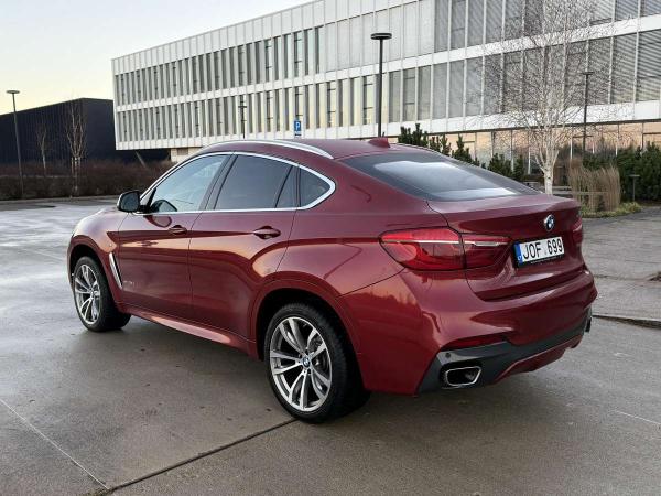 Red BMW X6 2017 in Vilnius, with an engine capacity of 2.99 L and mileage of 191 thousand km for 22900 €, photo 2 on AUTOMOTO.COM.LV