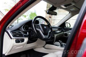 Red BMW X6 2017 in Riga, with an engine capacity of 3.00 L and mileage of 175 thousand km for 29000 €, photo 7 on AUTOMOTO.COM.LV