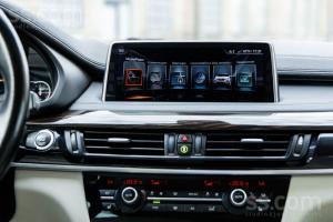 Red BMW X6 2017 in Riga, with an engine capacity of 3.00 L and mileage of 175 thousand km for 29000 €, photo 10 on AUTOMOTO.COM.LV