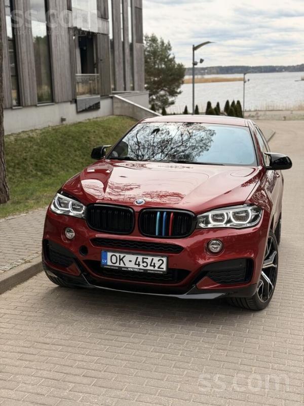Red BMW X6 2017 in Riga, with an engine capacity of 3.00 L and mileage of 109 thousand km for 32500 €, photo 2 on AUTOMOTO.COM.LV