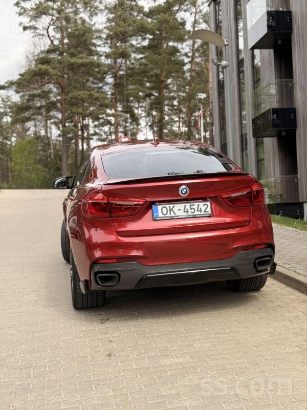 Red BMW X6 2017 in Riga, with an engine capacity of 3.00 L and mileage of 109 thousand km for 32500 €, photo 4 on AUTOMOTO.COM.LV