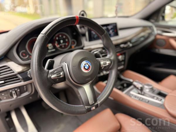 Red BMW X6 2017 in Riga, with an engine capacity of 3.00 L and mileage of 109 thousand km for 32500 €, photo 5 on AUTOMOTO.COM.LV