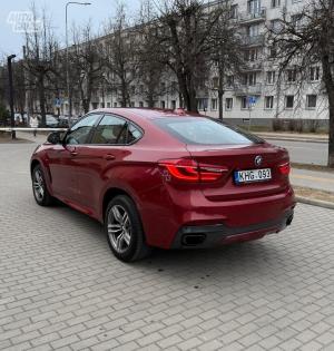 Red BMW X6 2018 in Vilnius, with an engine capacity of 3.00 L and mileage of 243 thousand km for 26200 €, photo 4 on AUTOMOTO.COM.LV