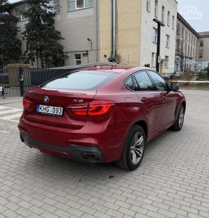 Red BMW X6 2018 in Vilnius, with an engine capacity of 3.00 L and mileage of 243 thousand km for 26200 €, photo 5 on AUTOMOTO.COM.LV