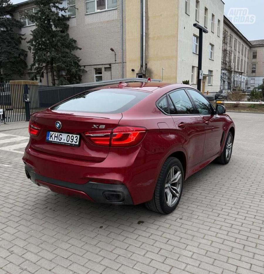 Red BMW X6 2018 in Vilnius, with an engine capacity of 3.00 L and mileage of 243 thousand km for 26200 €, photo 5 on AUTOMOTO.COM.LV