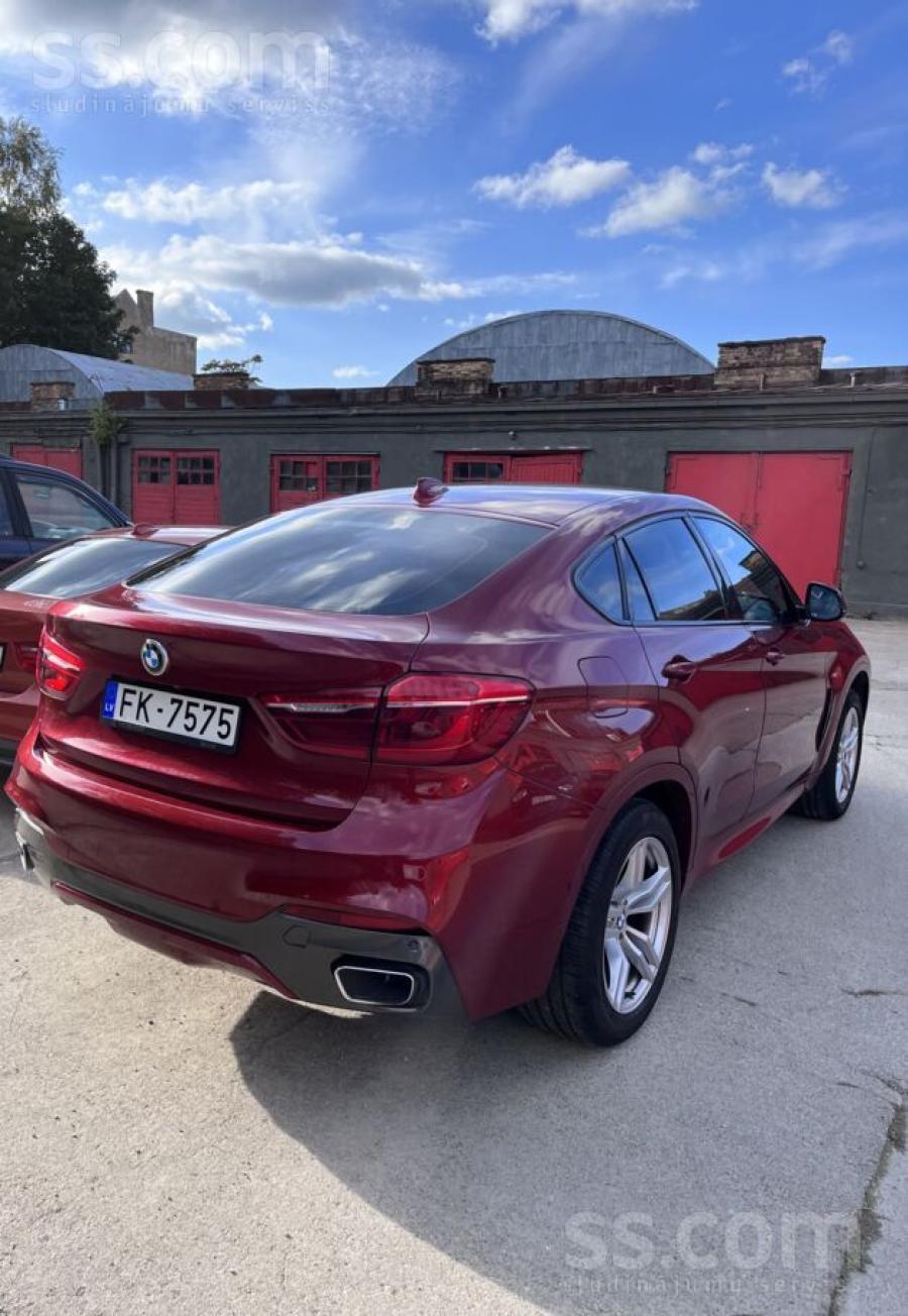 Red BMW X6 2018 in Riga, with an engine capacity of 3.00 L and mileage of 145 thousand km for 28500 €, photo 3 on AUTOMOTO.COM.LV