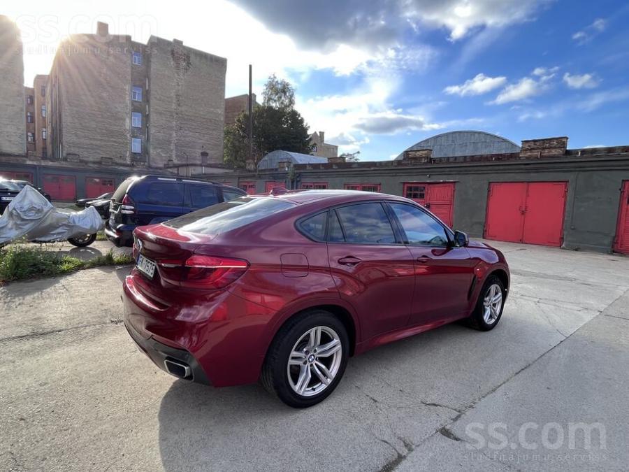 Red BMW X6 2018 in Riga, with an engine capacity of 3.00 L and mileage of 145 thousand km for 28500 €, photo 5 on AUTOMOTO.COM.LV