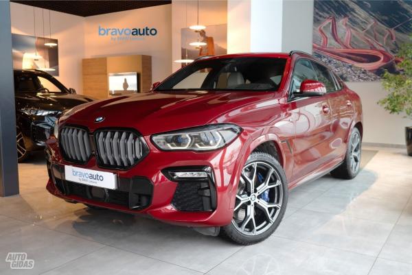 Red BMW X6 2020 in Kaunas, with an engine capacity of 3.00 L and mileage of 149 thousand km for 55794 €, photo 1 on AUTOMOTO.COM.LV