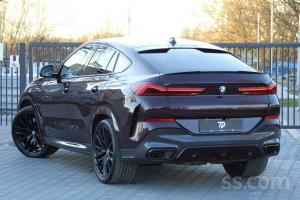 Red BMW X6 2020 in Jelgava, with an engine capacity of 3.00 L and mileage of 109 thousand km for 53900 €, photo 5 on AUTOMOTO.COM.LV