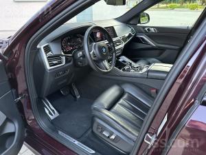 Red BMW X6 2020 in Jelgava, with an engine capacity of 3.00 L and mileage of 118 thousand km for 53500 €, photo 9 on AUTOMOTO.COM.LV
