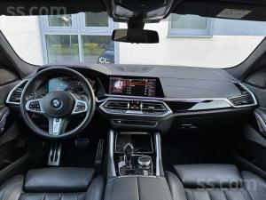 Red BMW X6 2020 in Jelgava, with an engine capacity of 3.00 L and mileage of 118 thousand km for 53500 €, photo 11 on AUTOMOTO.COM.LV