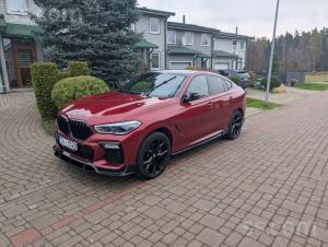 Red BMW X6 2021 in Riga, with an engine capacity of 3.00 L and mileage of 118 thousand km for 51000 €, photo  on AUTOMOTO.COM.LV