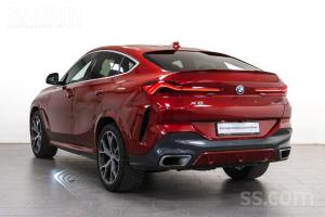 Red BMW X6 2021 in Riga, with an engine capacity of 3.00 L and mileage of 112 thousand km for 55000 €, photo 3 on AUTOMOTO.COM.LV