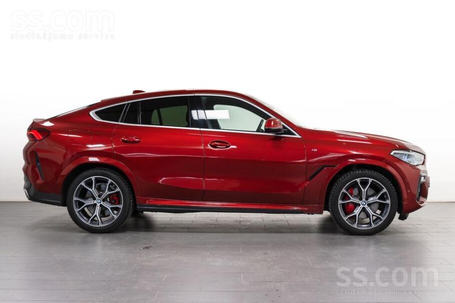 Red BMW X6 2021 in Riga, with an engine capacity of 3.00 L and mileage of 112 thousand km for 55000 €, photo 5 on AUTOMOTO.COM.LV