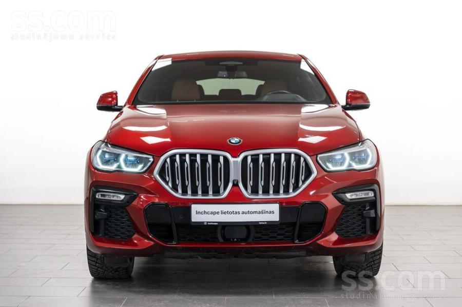 Red BMW X6 2021 in Riga, with an engine capacity of 3.00 L and mileage of 112 thousand km for 55000 €, photo 7 on AUTOMOTO.COM.LV