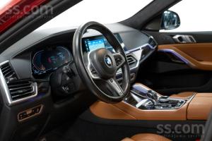 Red BMW X6 2021 in Riga, with an engine capacity of 3.00 L and mileage of 112 thousand km for 55000 €, photo 20 on AUTOMOTO.COM.LV