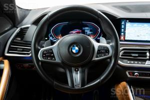 Red BMW X6 2021 in Riga, with an engine capacity of 3.00 L and mileage of 112 thousand km for 55000 €, photo 25 on AUTOMOTO.COM.LV