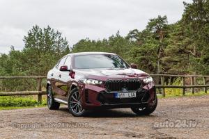 Sarkans BMW X6 2024 Tallina, ar dzinēja tilpumu 3.00 L un nobraukumu 45 tūkst. km par 91500 €, foto  vietnē AUTOMOTO.COM.LV