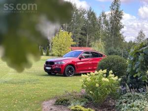 Red BMW X6 2018 in Liepaja, with an engine capacity of 3.00 L and mileage of 128 thousand km for 34990 €, photo  on AUTOMOTO.COM.LV