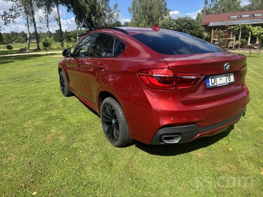 Red BMW X6 2018 in Liepaja, with an engine capacity of 3.00 L and mileage of 128 thousand km for 34990 €, photo 4 on AUTOMOTO.COM.LV