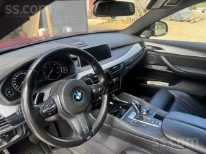 Red BMW X6 2018 in Liepaja, with an engine capacity of 3.00 L and mileage of 128 thousand km for 34990 €, photo 7 on AUTOMOTO.COM.LV