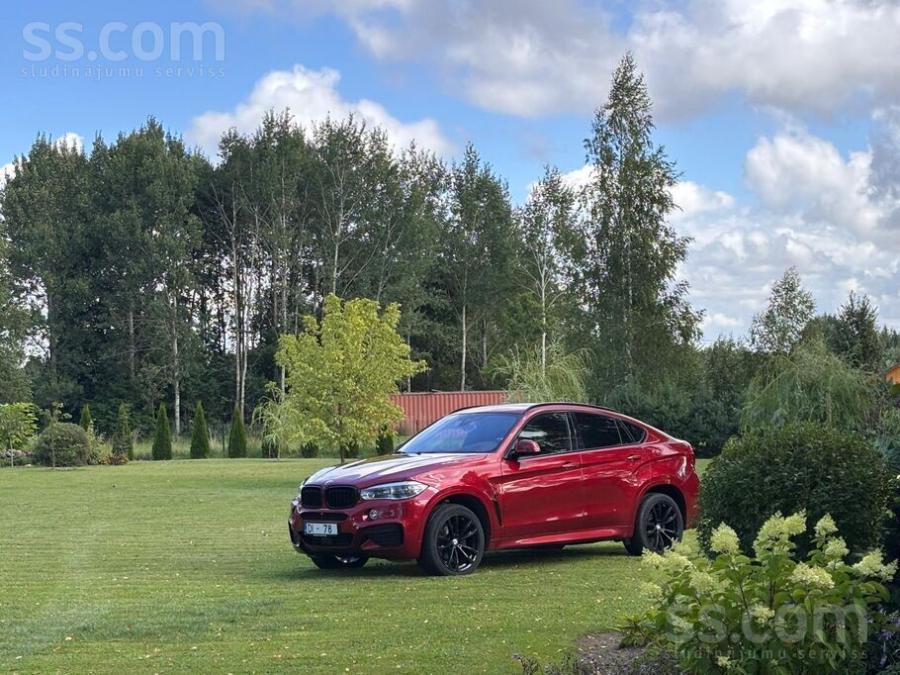 Red BMW X6 2018 in Liepaja, with an engine capacity of 3.00 L and mileage of 128 thousand km for 34990 €, photo 15 on AUTOMOTO.COM.LV