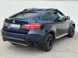 Violet BMW X6 2013 in Riga, with an engine capacity of 3.00 L and mileage of 0 thousand km for 12750 €, photo 5 on AUTOMOTO.COM.LV