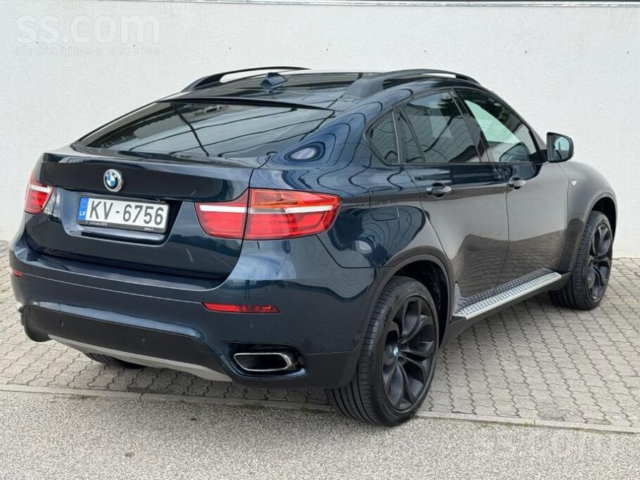 Violet BMW X6 2013 in Riga, with an engine capacity of 3.00 L and mileage of 0 thousand km for 12750 €, photo 5 on AUTOMOTO.COM.LV