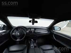 Violet BMW X6 2013 in Riga, with an engine capacity of 3.00 L and mileage of 0 thousand km for 12750 €, photo 7 on AUTOMOTO.COM.LV