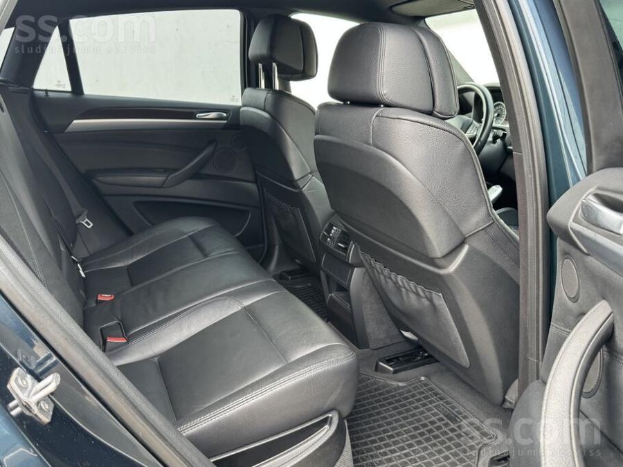 Violet BMW X6 2013 in Riga, with an engine capacity of 3.00 L and mileage of 0 thousand km for 12750 €, photo 9 on AUTOMOTO.COM.LV