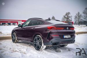 Violet BMW X6 2020 in Riga, with an engine capacity of 2.99 L and mileage of 77 thousand km for 56990 €, photo 6 on AUTOMOTO.COM.LV