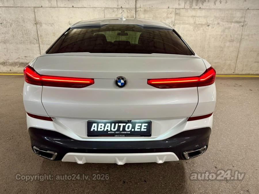 White BMW X6 2020 in Tallinn, with an engine capacity of 3.00 L and mileage of 115 thousand km for 54995 €, photo 26 on AUTOMOTO.COM.LV