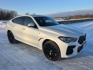 Balts BMW X6 2022 Tallina, ar dzinēja tilpumu 3.00 L un nobraukumu 82 tūkst. km par 74000 €, foto  vietnē AUTOMOTO.COM.LV