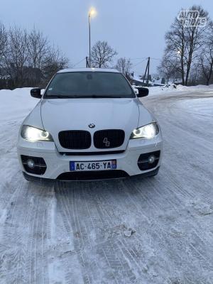 White BMW X6 2009 in Ukmerge, with an engine capacity of 3.00 L and mileage of 334 thousand km for 12000 €, photo  on AUTOMOTO.COM.LV
