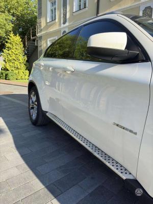 White BMW X6 2009 in Marijampole, with an engine capacity of 2.99 L and mileage of 330 thousand km for 11900 €, photo 8 on AUTOMOTO.COM.LV