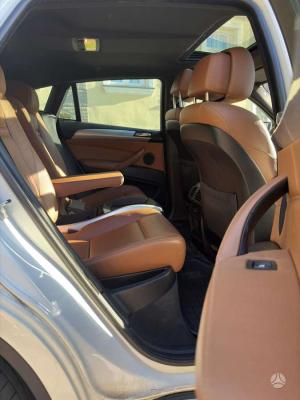 White BMW X6 2009 in Marijampole, with an engine capacity of 2.99 L and mileage of 330 thousand km for 11900 €, photo 23 on AUTOMOTO.COM.LV