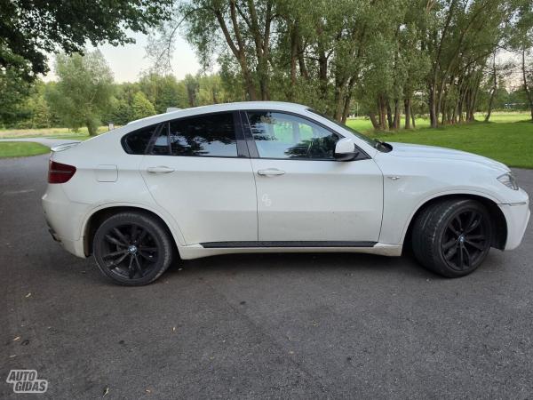 White BMW X6 2009 in Silute, with an engine capacity of 3.00 L and mileage of 390 thousand km for 9200 €, photo 4 on AUTOMOTO.COM.LV