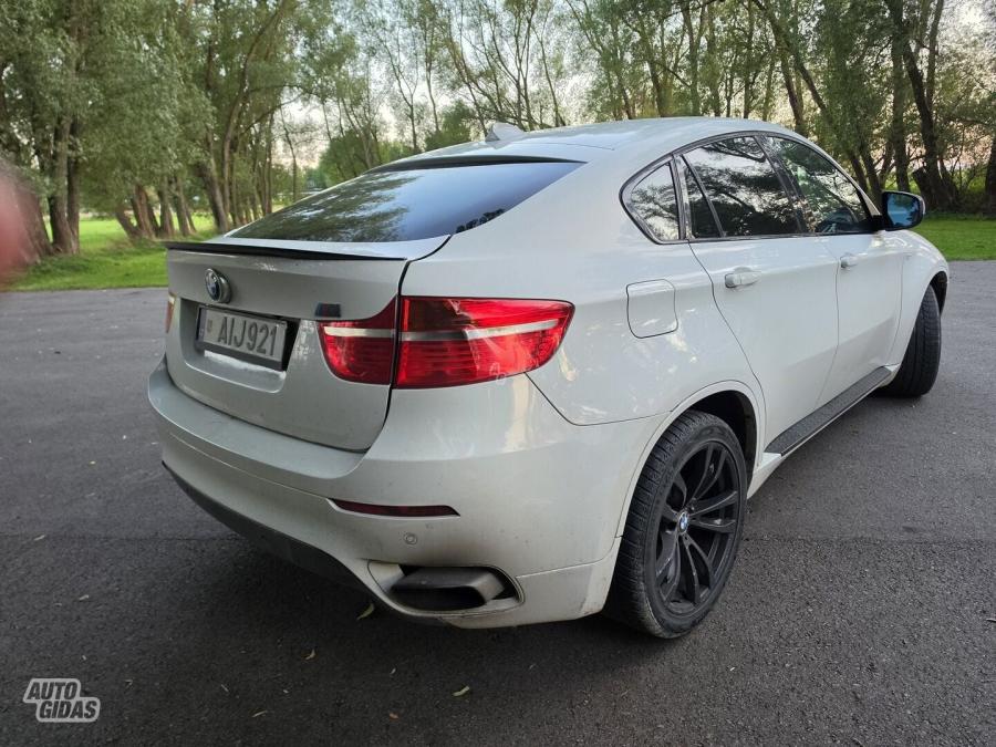 White BMW X6 2009 in Silute, with an engine capacity of 3.00 L and mileage of 390 thousand km for 9200 €, photo 6 on AUTOMOTO.COM.LV