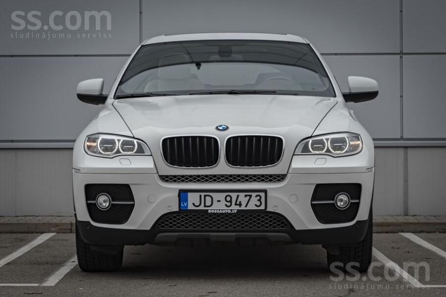 White BMW X6 2010 in Riga, with an engine capacity of 3.00 L and mileage of 239 thousand km for 9990 €, photo 3 on AUTOMOTO.COM.LV