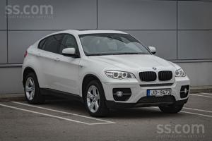 White BMW X6 2010 in Riga, with an engine capacity of 3.00 L and mileage of 239 thousand km for 9990 €, photo 4 on AUTOMOTO.COM.LV