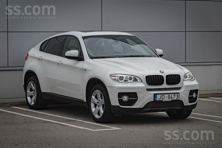 White BMW X6 2010 in Riga, with an engine capacity of 3.00 L and mileage of 239 thousand km for 9990 €, photo 4 on AUTOMOTO.COM.LV