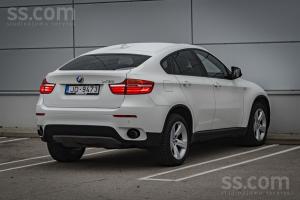 White BMW X6 2010 in Riga, with an engine capacity of 3.00 L and mileage of 239 thousand km for 9990 €, photo 5 on AUTOMOTO.COM.LV