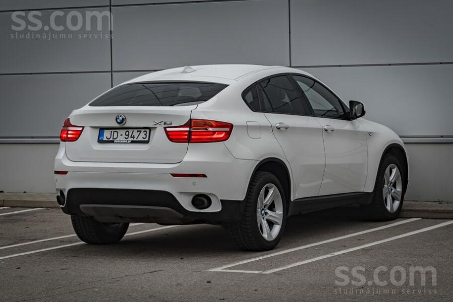 White BMW X6 2010 in Riga, with an engine capacity of 3.00 L and mileage of 239 thousand km for 9990 €, photo 5 on AUTOMOTO.COM.LV