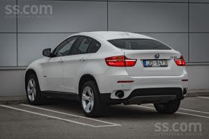 White BMW X6 2010 in Riga, with an engine capacity of 3.00 L and mileage of 239 thousand km for 9990 €, photo 7 on AUTOMOTO.COM.LV