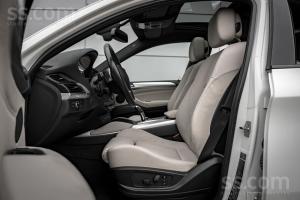 White BMW X6 2010 in Riga, with an engine capacity of 3.00 L and mileage of 239 thousand km for 9990 €, photo 12 on AUTOMOTO.COM.LV