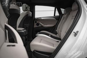 White BMW X6 2010 in Riga, with an engine capacity of 3.00 L and mileage of 239 thousand km for 9990 €, photo 15 on AUTOMOTO.COM.LV