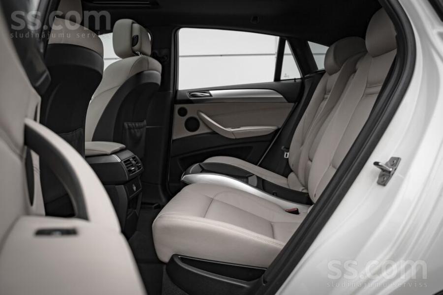 White BMW X6 2010 in Riga, with an engine capacity of 3.00 L and mileage of 239 thousand km for 9990 €, photo 15 on AUTOMOTO.COM.LV
